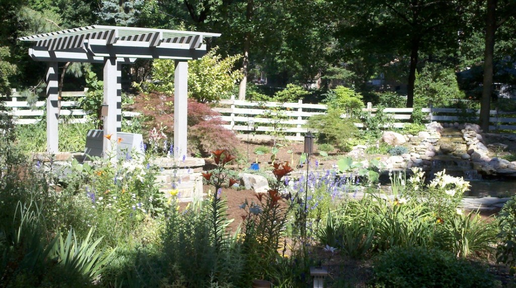 Two sided viewing bench with stonework - Serenity Creek Design ...